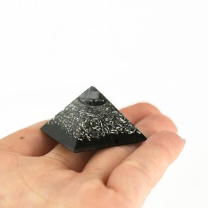 Handmade orgone pyramid with grounding hematite crystal